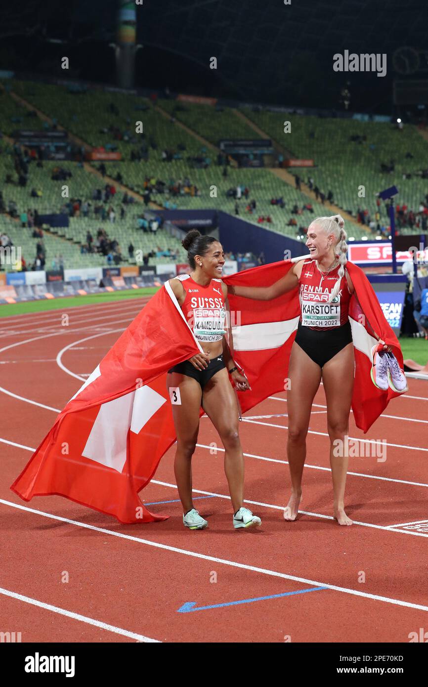Mujinga KAMBUNDJI & Ida KARSTOFT with National Flags after the 200m ...