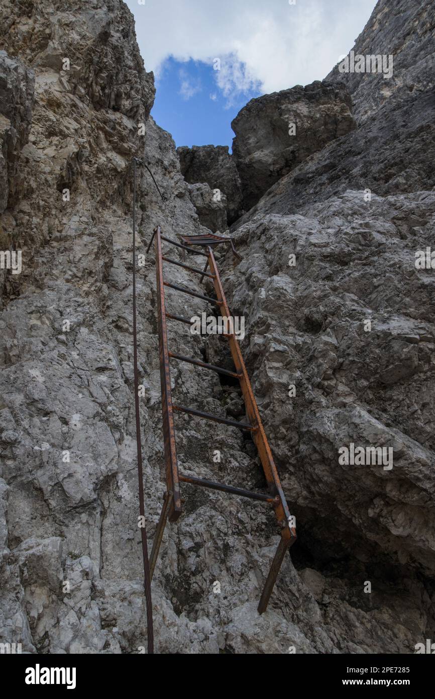 Elements set by man to facilitate the route via ferrata. Dolomites ...