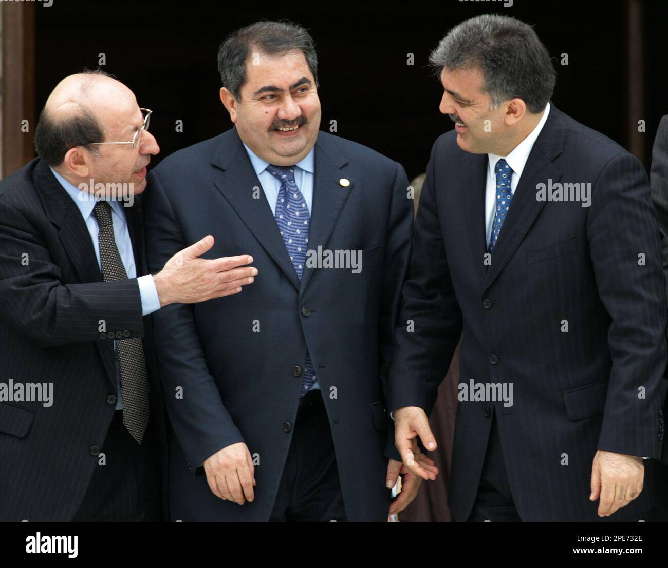 Jordanian Foreign Minister Farouk Kasrawi, left, chats with his ...