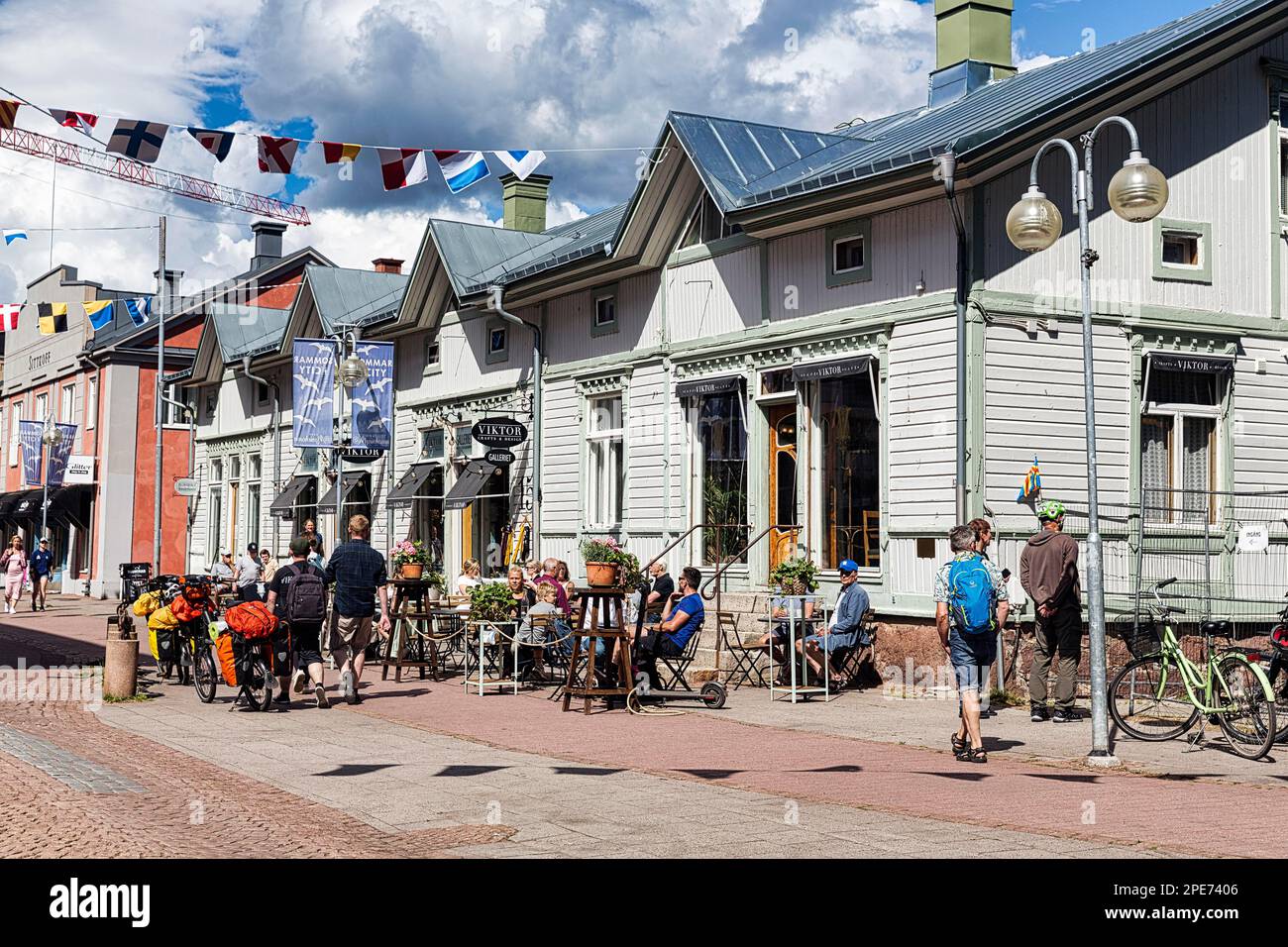 Pedestrian zone with cafe in summer, tourists, Mariehamn, Aland Islands ...