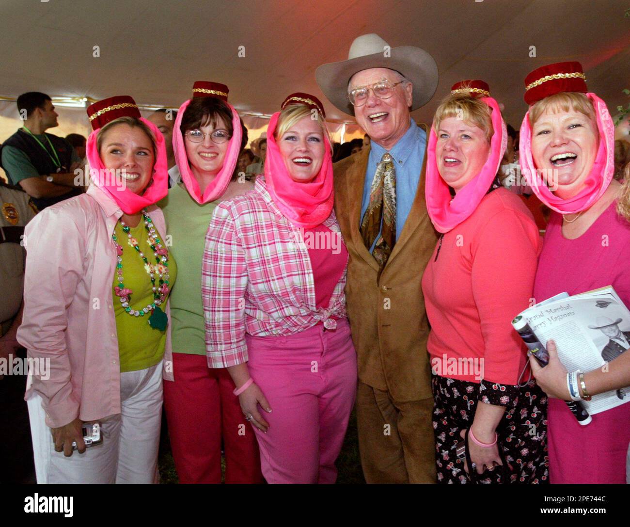 Veteran actor Larry Hagman, third from right, is surrounded by ...