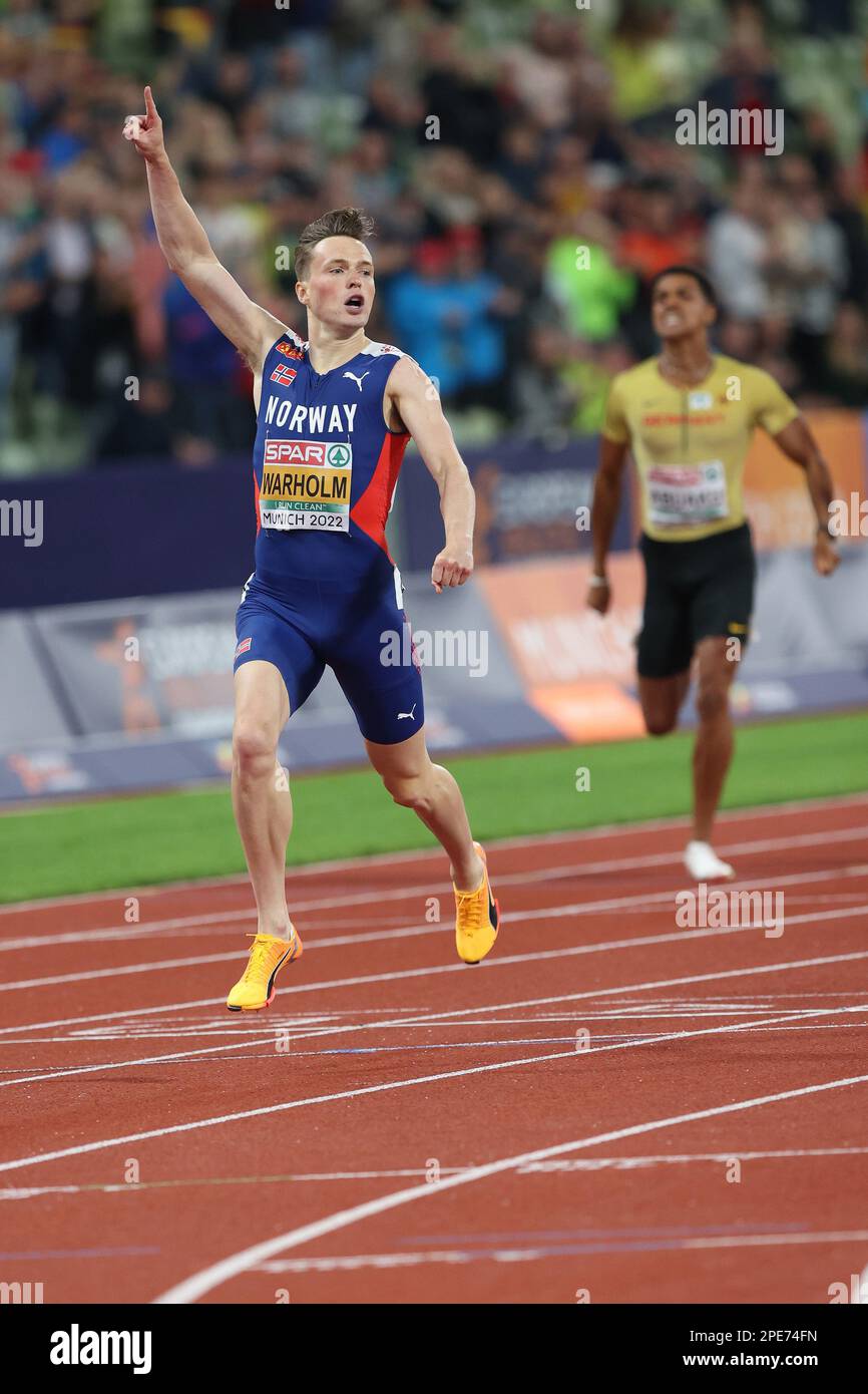 Karsten WARHOLM celebrating as crossing the finish line to win the 400m ...