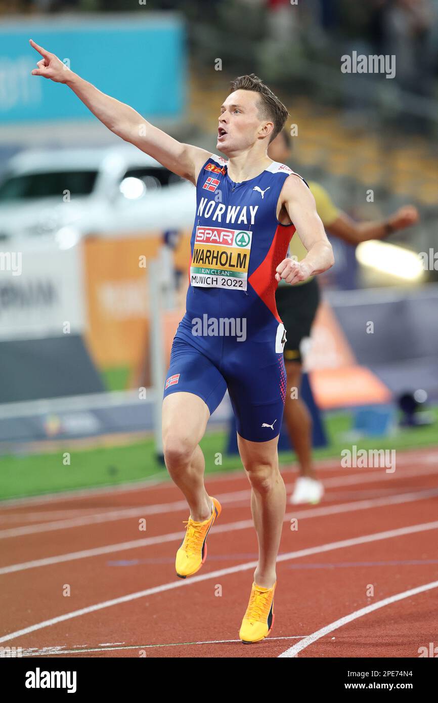 Karsten WARHOLM celebrating as crossing the finish line to win the 400m ...