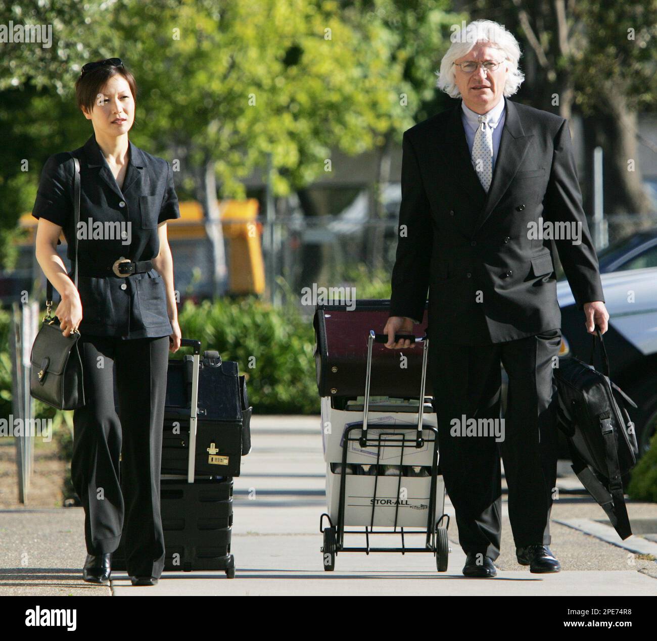 Michael Jackson's lawyers Susan Yu (L) and Thomas Mesereau, Jr. (R ...