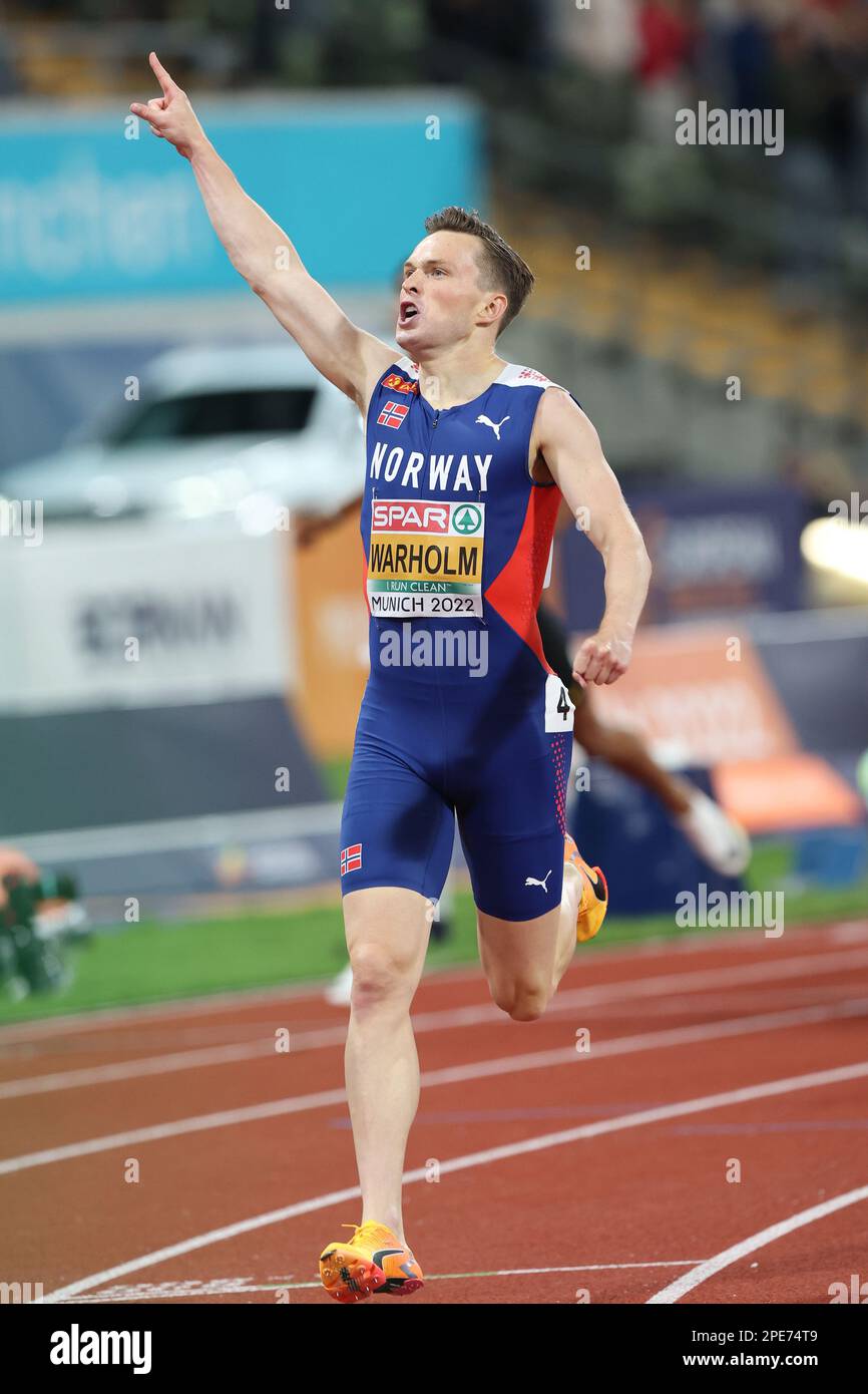 Karsten WARHOLM celebrating as crossing the finish line to win the 400m ...