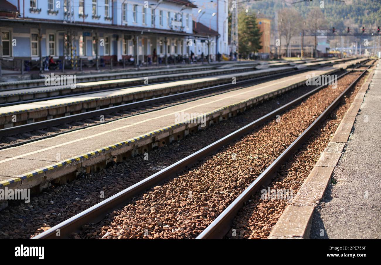 Train station in small city on sunny day, shallow depth of field photo ...