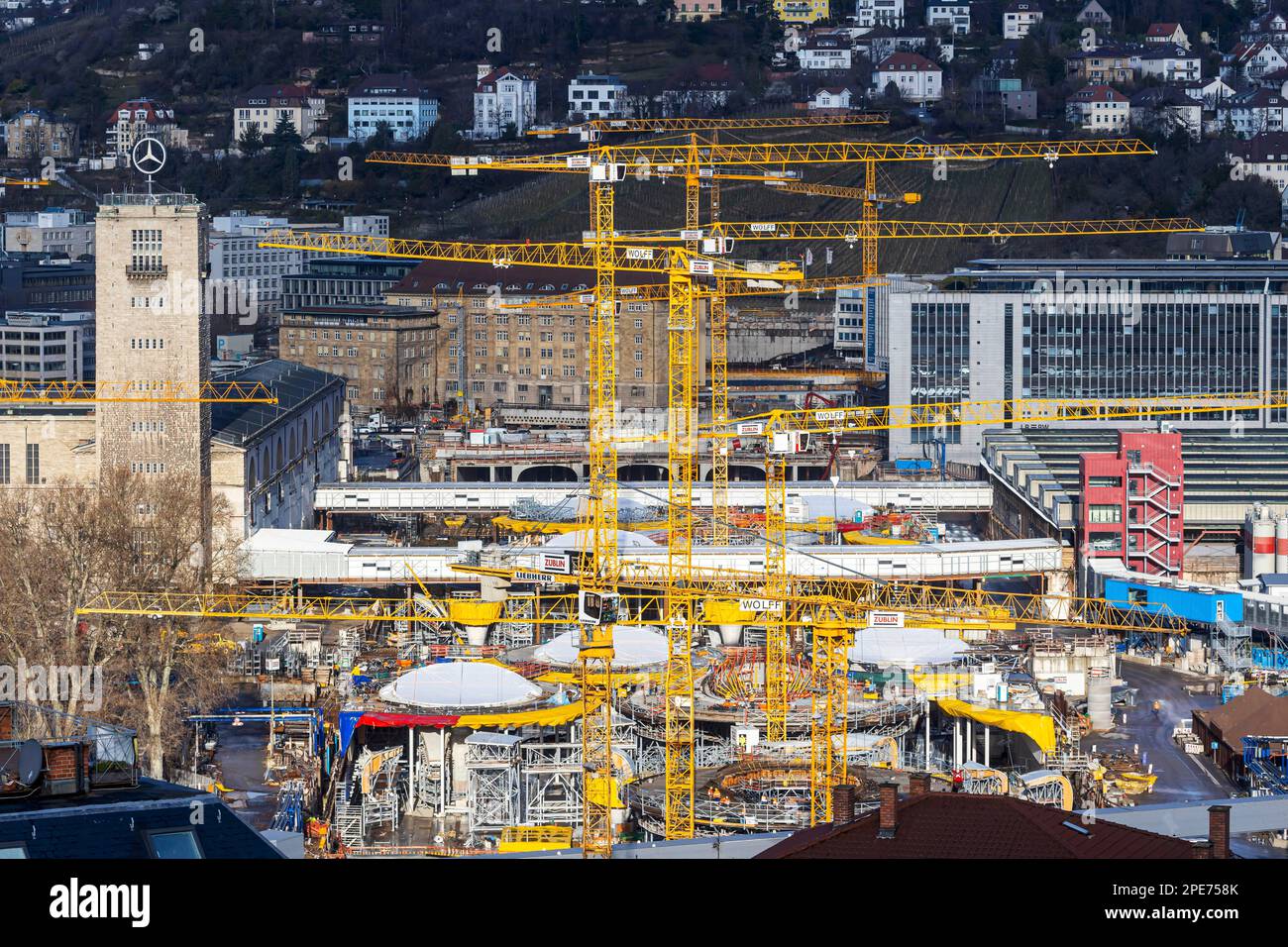 Large construction site for the new underground station with cranes. In ...