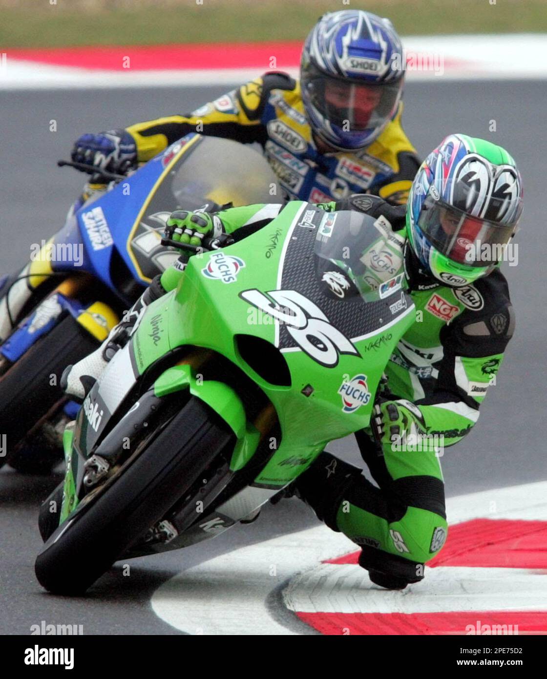 Japan's Shinya Nakano, of the Kawasaki Racing Team, leads countryman ...