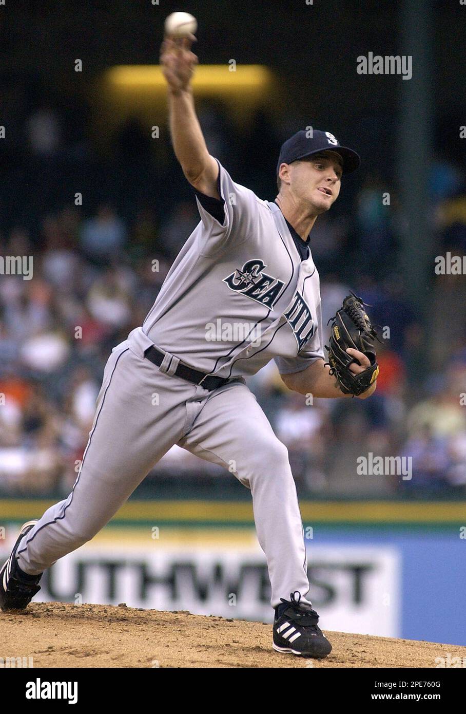 Seattle Mariners pitcher Gil Meche delivers to the Texas Rangers in the ...