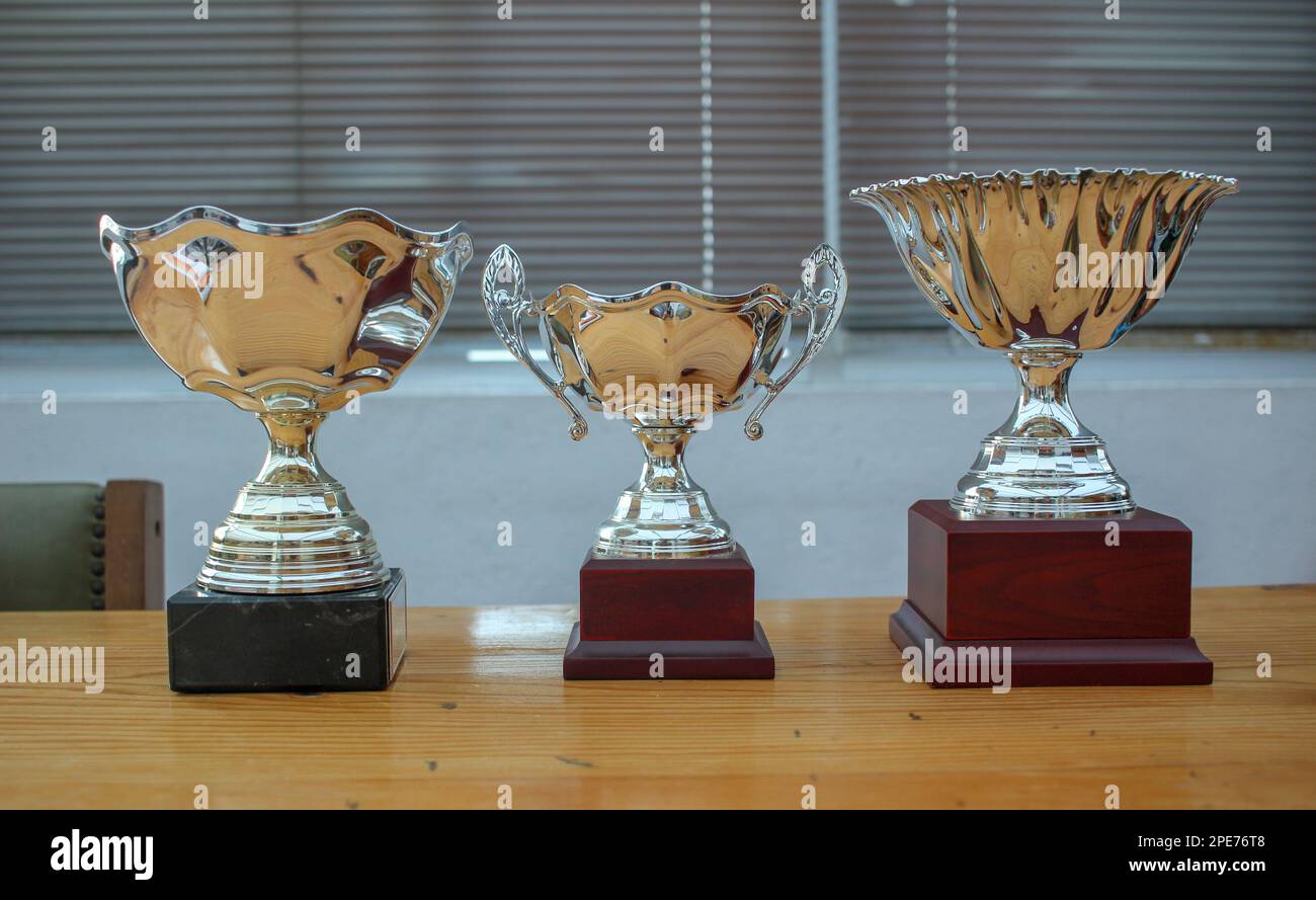 three cups for the best players of the tournament Stock Photo - Alamy