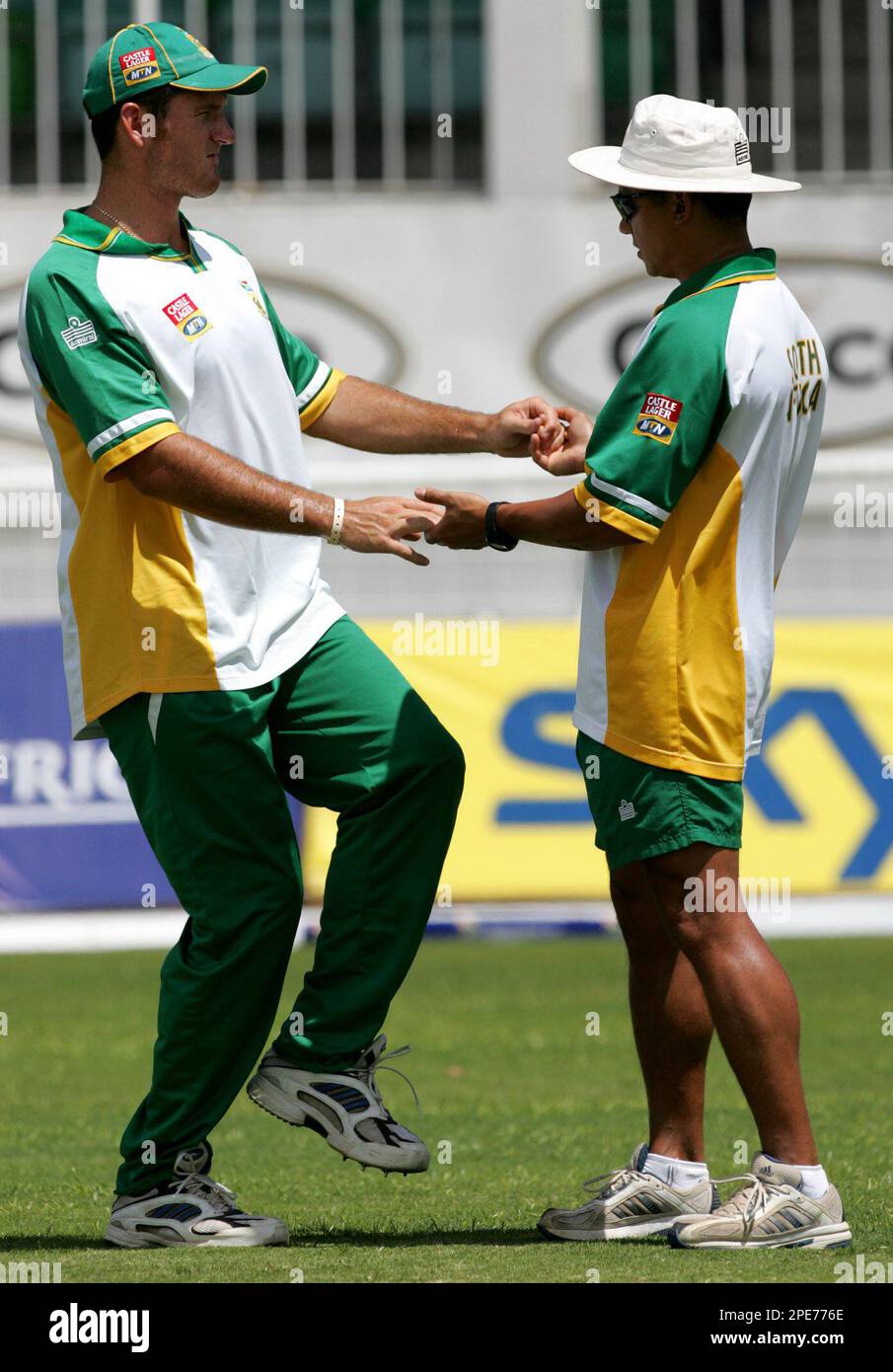 South Africa captain Graeme Smith, left, works with team ...