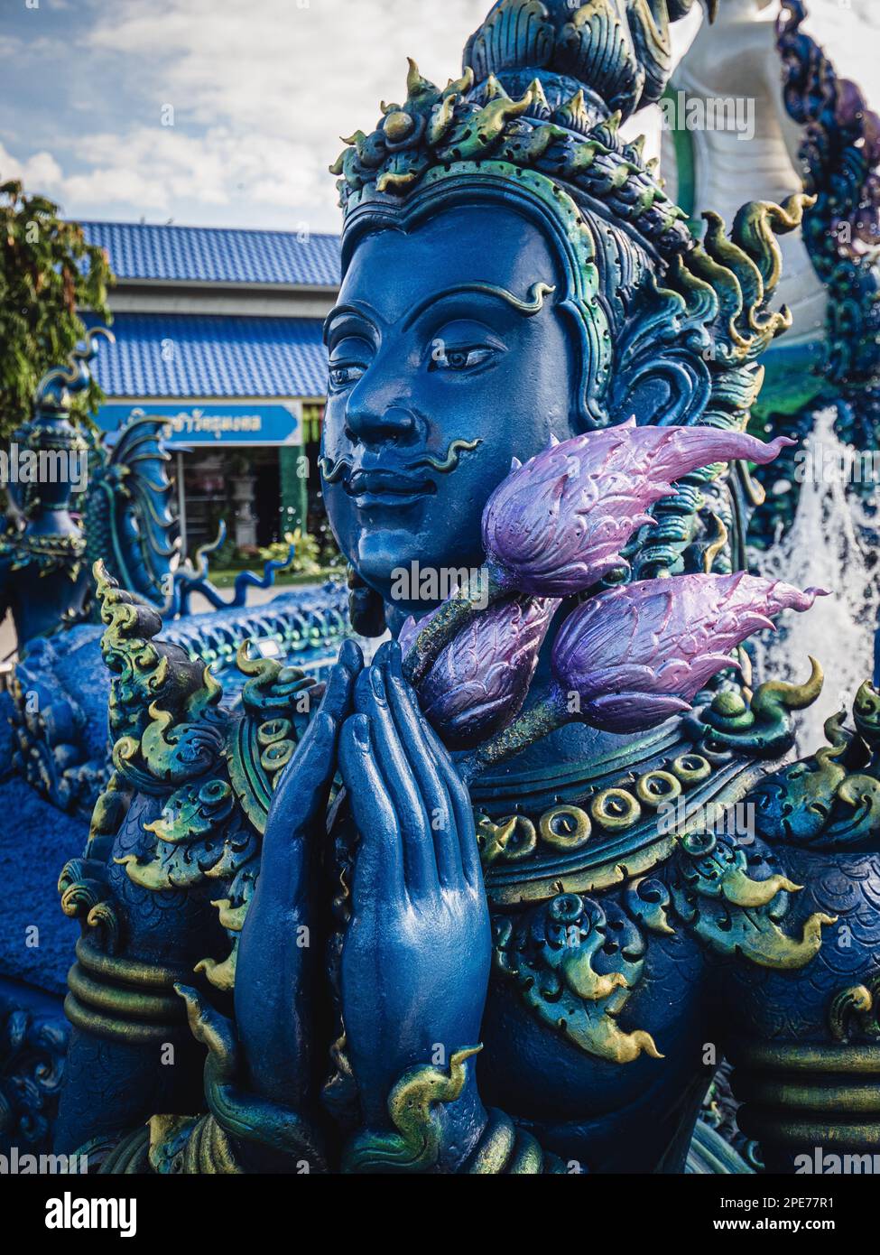 The blue god spirit Buddhist deity at Chiang Rai's Wat Rong Suea Ten ...