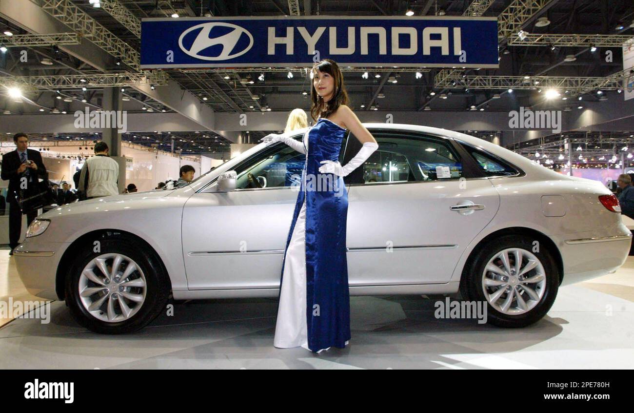 South Korean model poses next to South Korea automaker Hyundai's ...