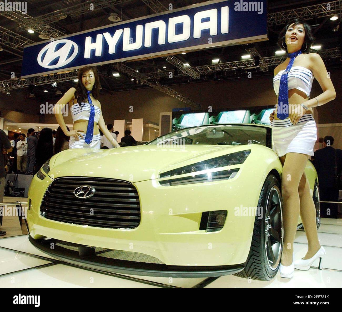 South Korean models pose next to South Korea automaker Hyundai's ...