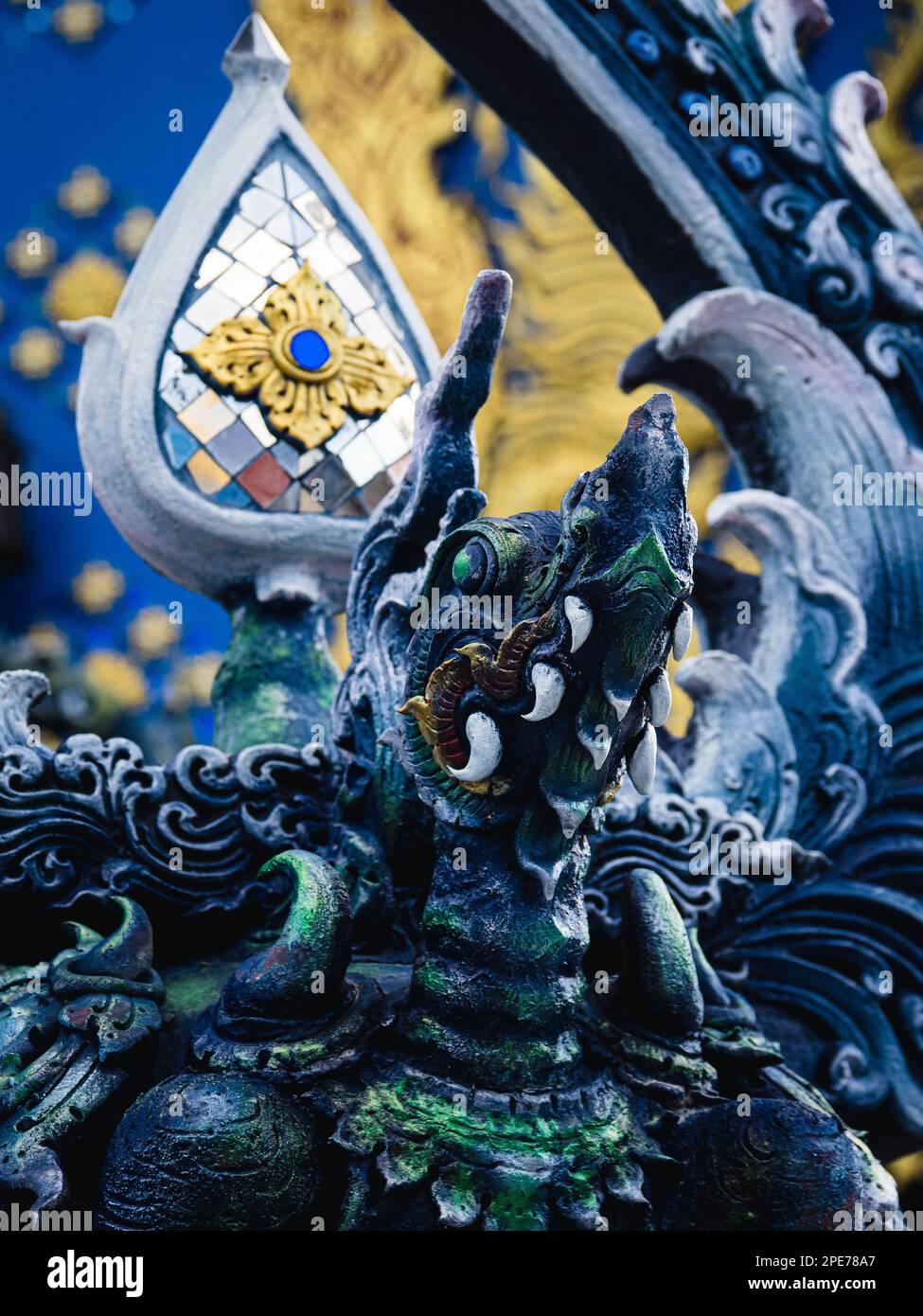 The blue god spirit Buddhist deity at Chiang Rai's Wat Rong Suea Ten ...