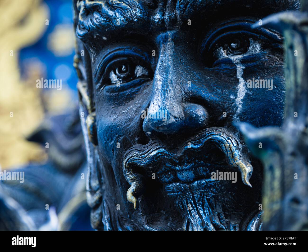 The blue god spirit Buddhist deity at Chiang Rai's Wat Rong Suea Ten ...