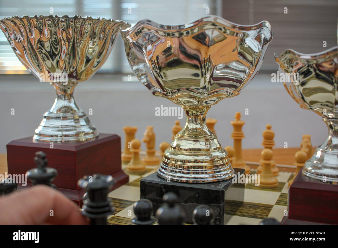 the trophies won on the chessboard Stock Photo - Alamy