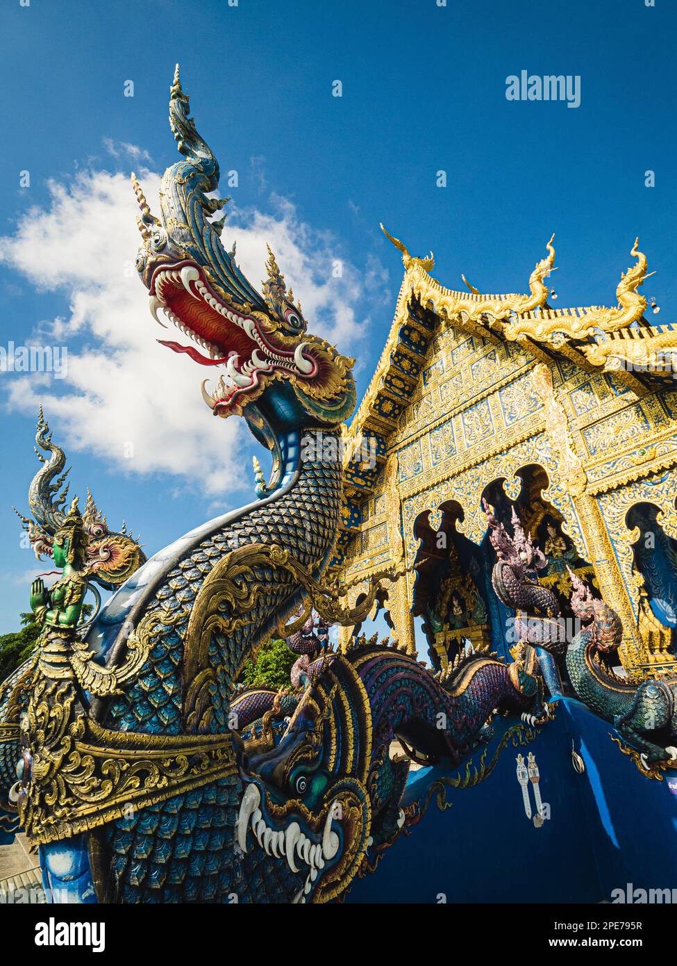 The blue god spirit Buddhist deity at Chiang Rai's Wat Rong Suea Ten ...