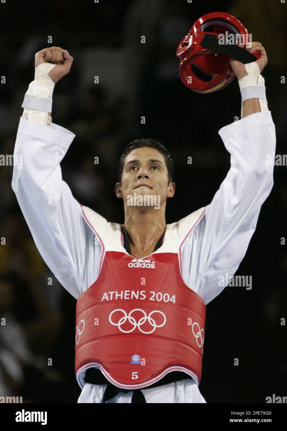 ** FILE ** Steven Lopez from the USA celebrates after winning the gold ...