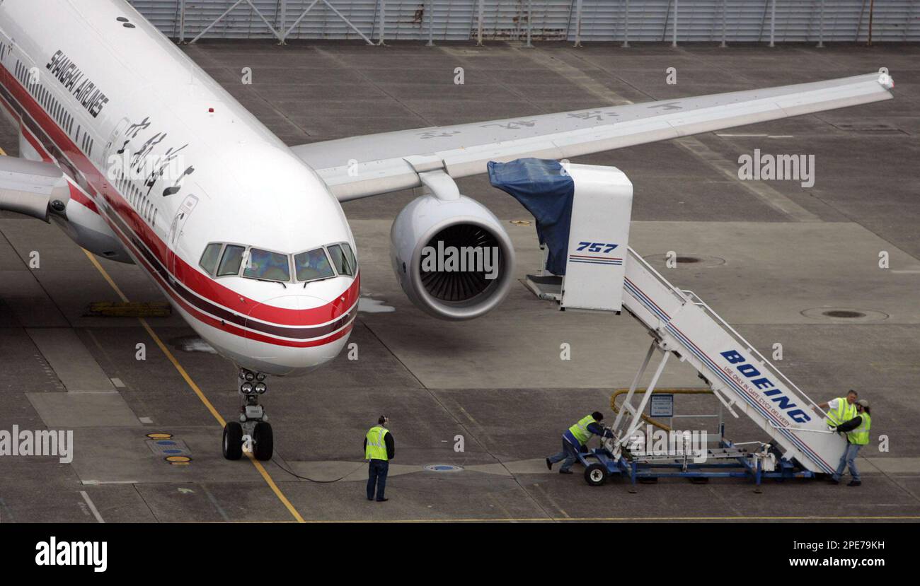 Stairs are pulled away from the final Boeing 757 built by The Boeing Co ...
