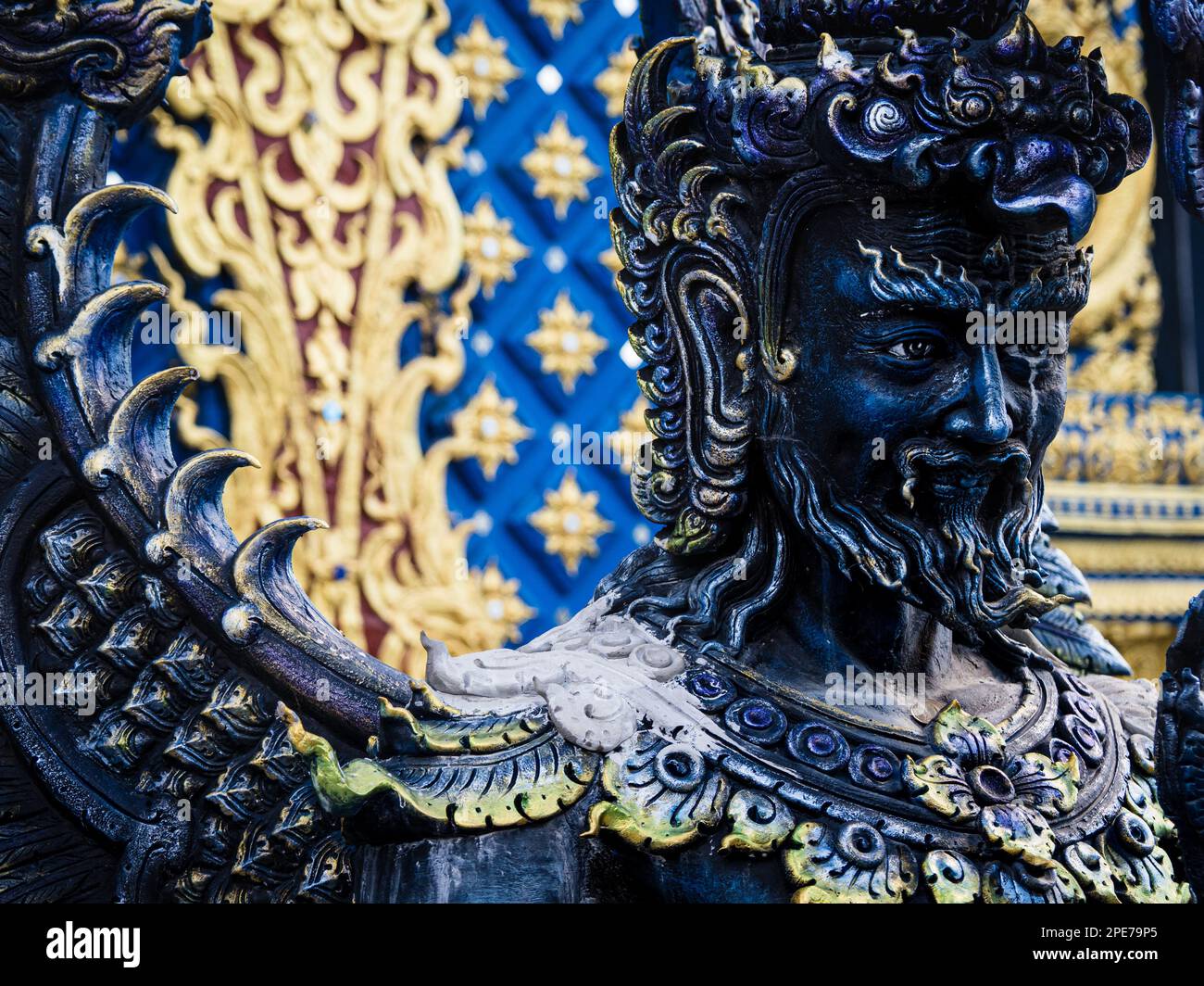 The blue god spirit Buddhist deity at Chiang Rai's Wat Rong Suea Ten ...