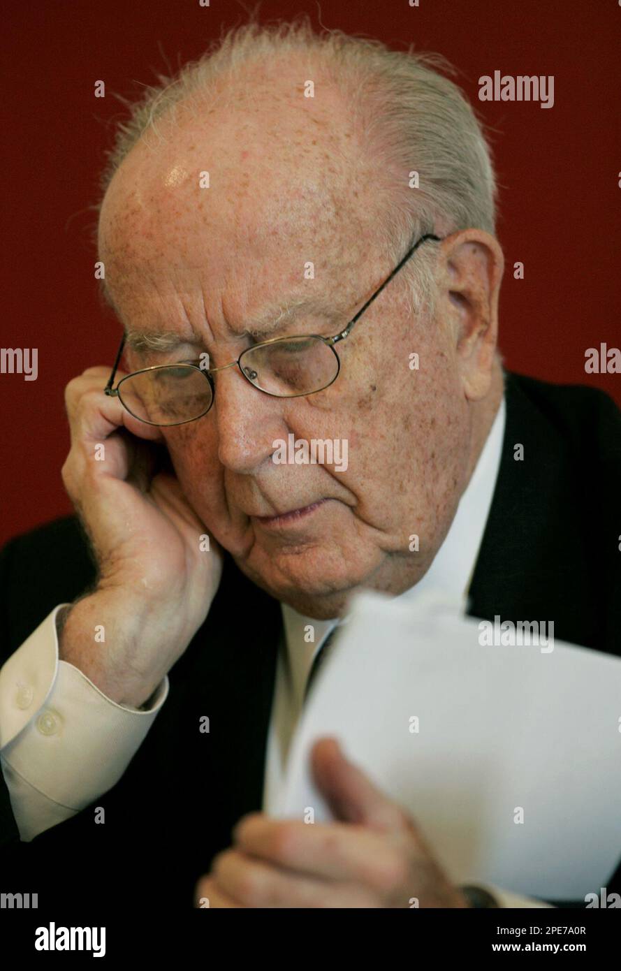 Maryland Comptroller William Donald Schaefer looks over material during ...