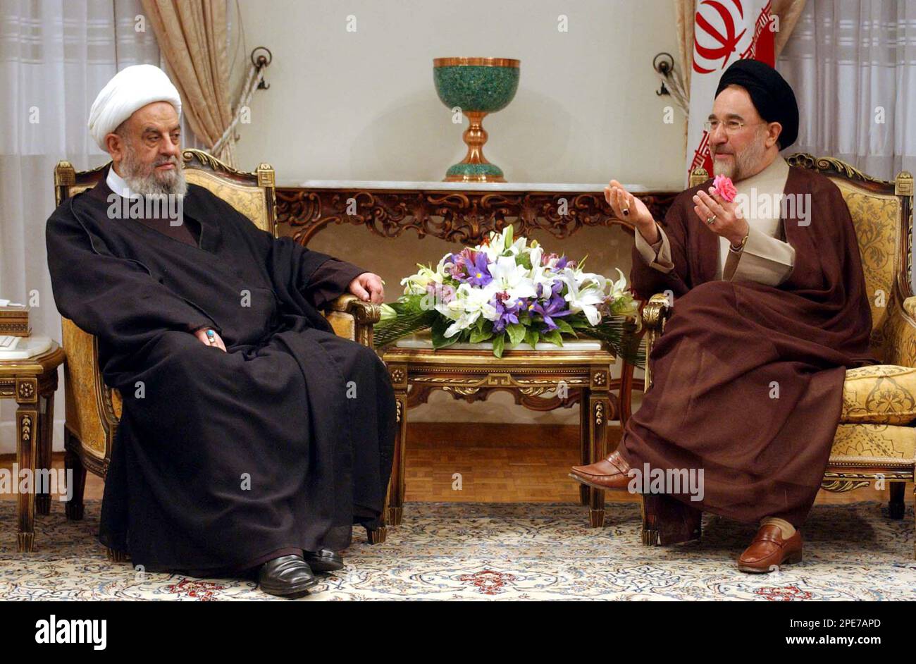 Iranian President Mohammad Khatami, right, talks with Sheik Abdel Amir ...