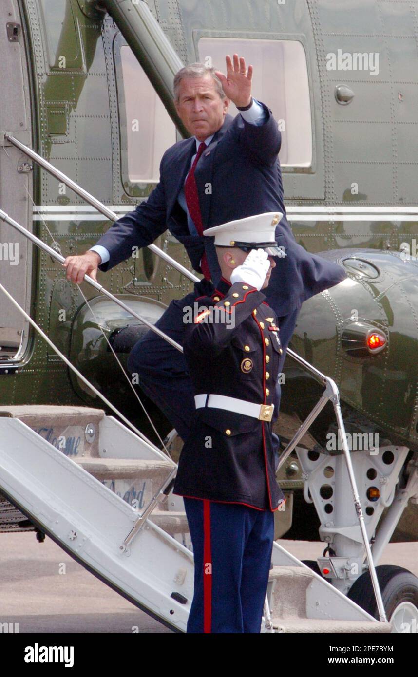 President George W. Bush boards Marine One at Ellington Field on his ...