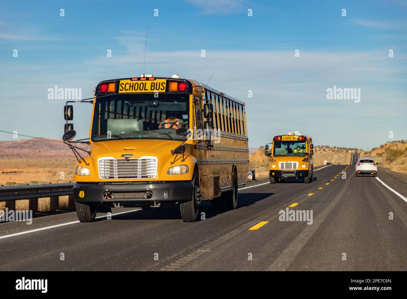 A picture of two American yellow schoolbuses in Arizona Stock Photo - Alamy