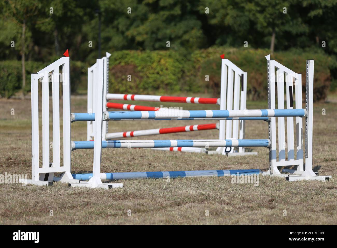 Show jumping poles obstacles, barriers, waiting for riders on show ...