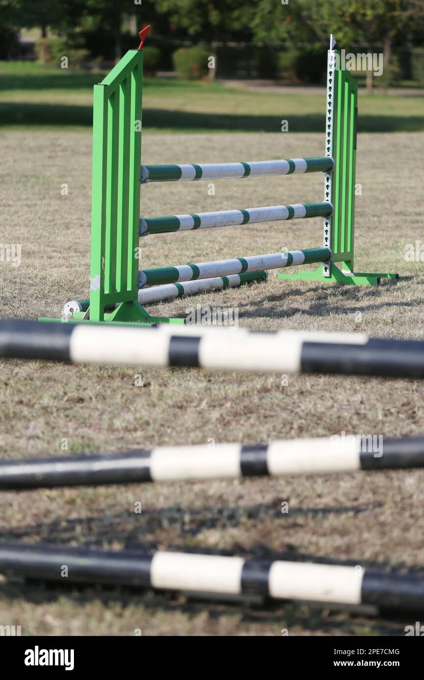 Show jumping poles obstacles, barriers, waiting for riders on show ...
