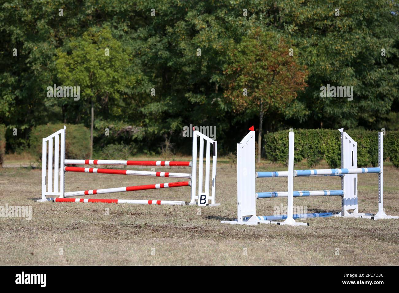 Show jumping poles obstacles, barriers, waiting for riders on show ...