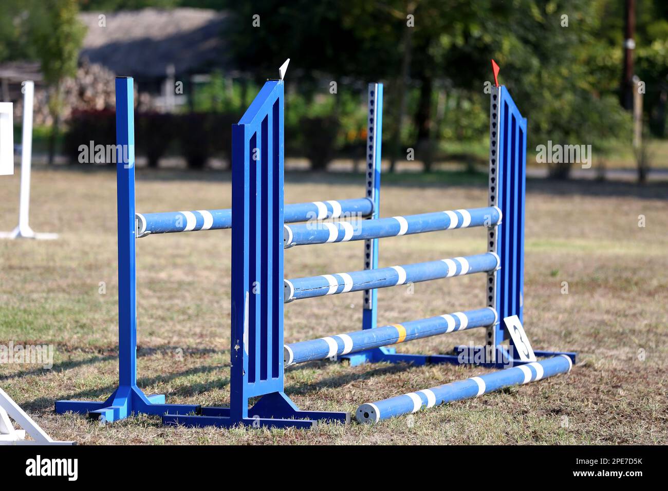 Show jumping poles obstacles, barriers, waiting for riders on show ...