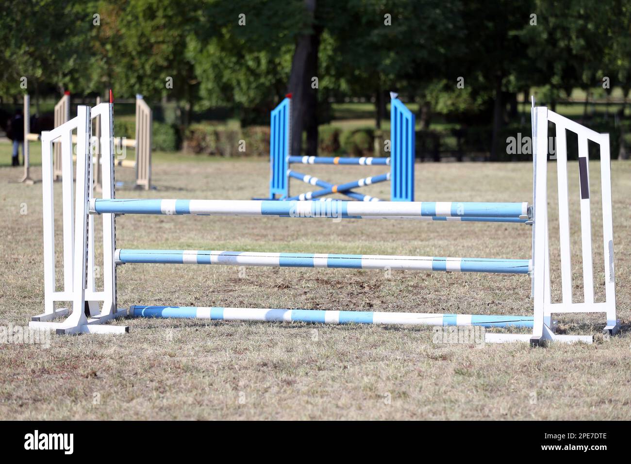 Show jumping poles obstacles, barriers, waiting for riders on show ...