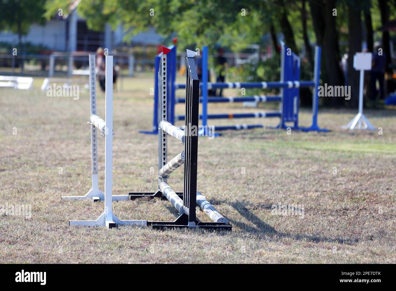 Show jumping poles obstacles, barriers, waiting for riders on show ...