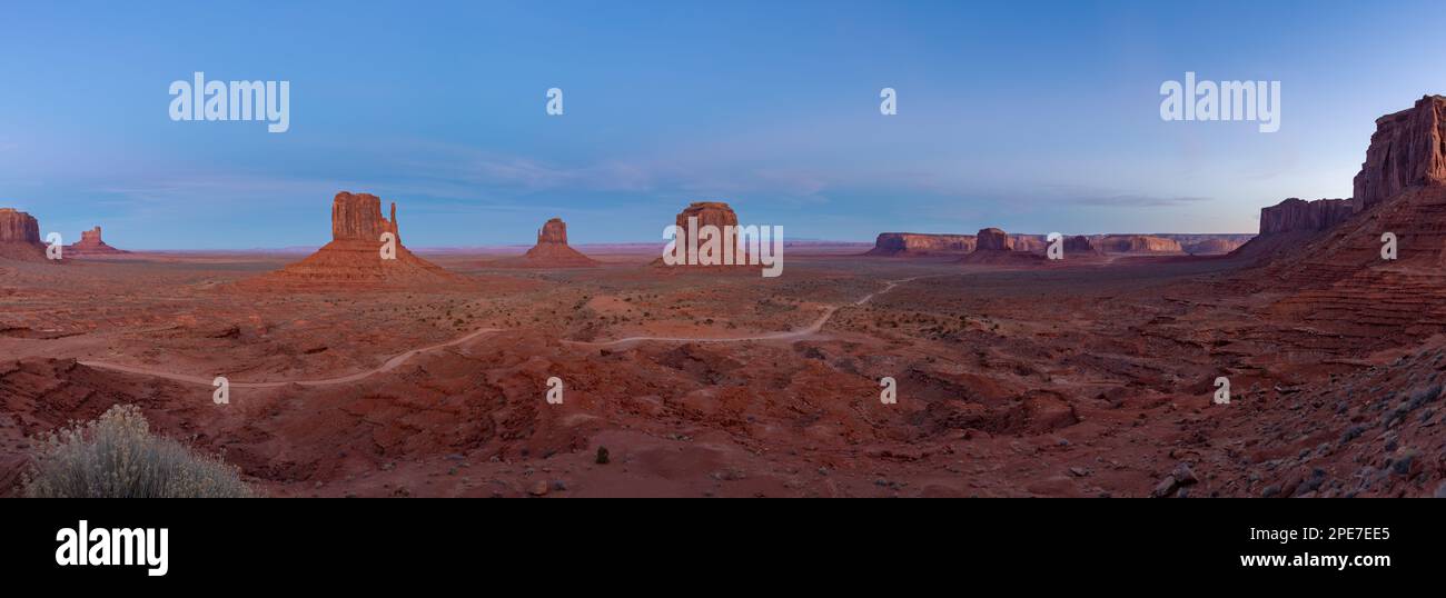 A panorama picture of the Monument Valley landscape at sunset, with the ...