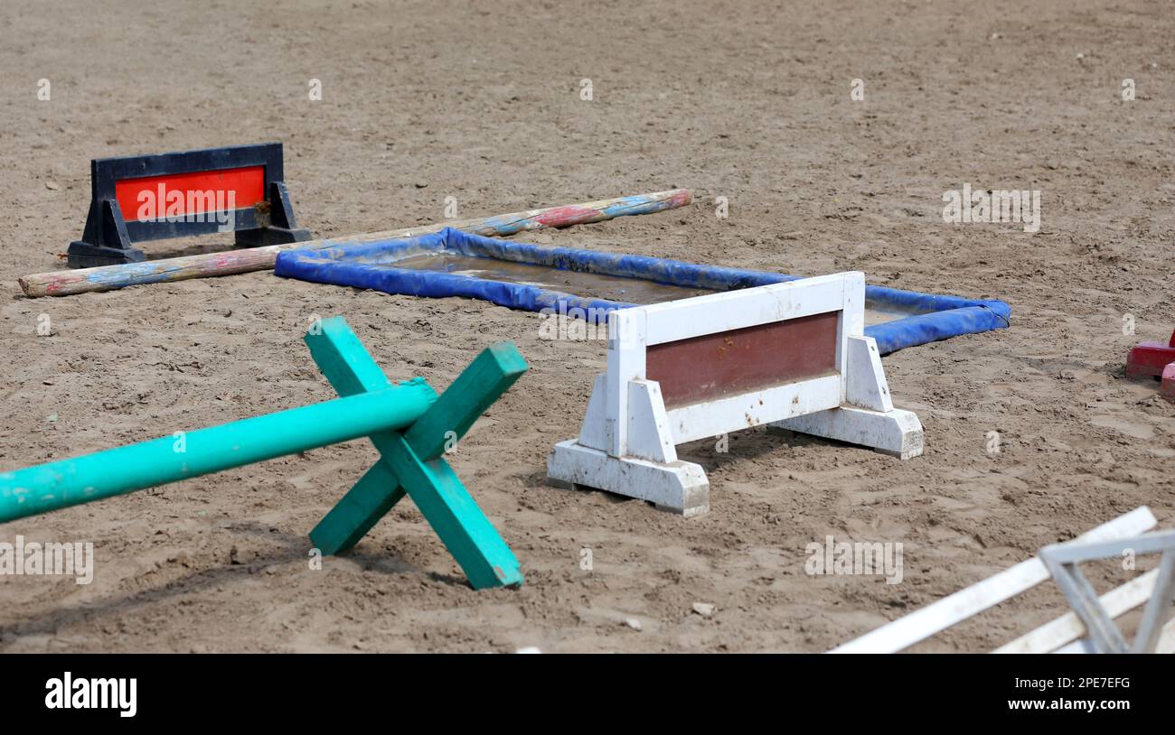Show jumping poles obstacles, barriers, waiting for riders on show ...
