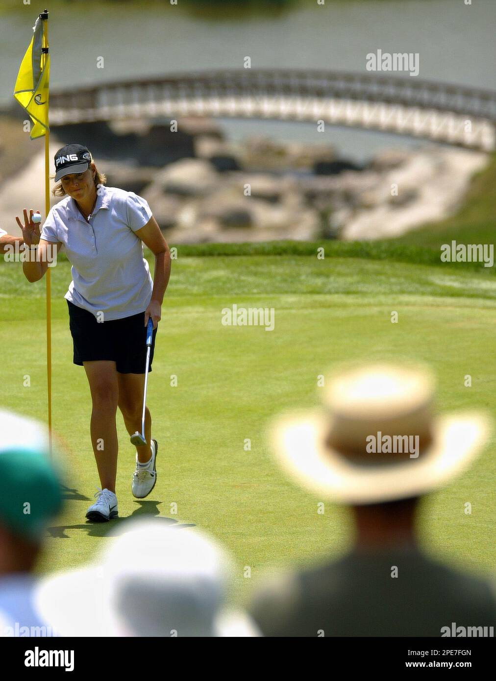 Wendy Ward, of United States, greets the audience at the 9th hole's ...
