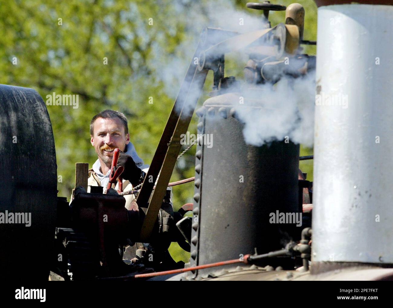 Drew Schumacher smiles as he operates a 1922 25-horsepower Russell ...