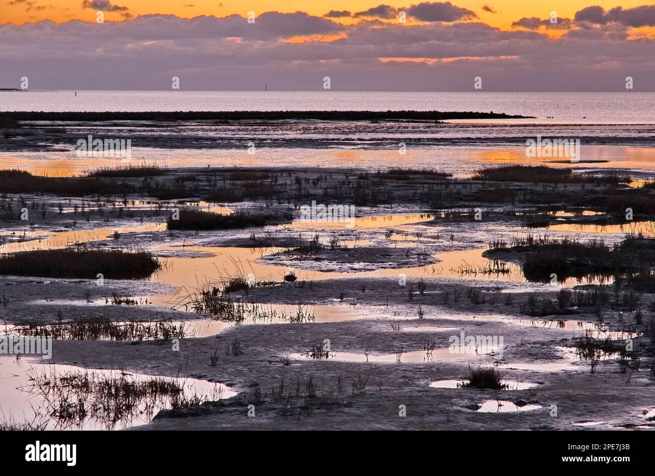 Evening landscape shortly after sunset with draining water in the ...