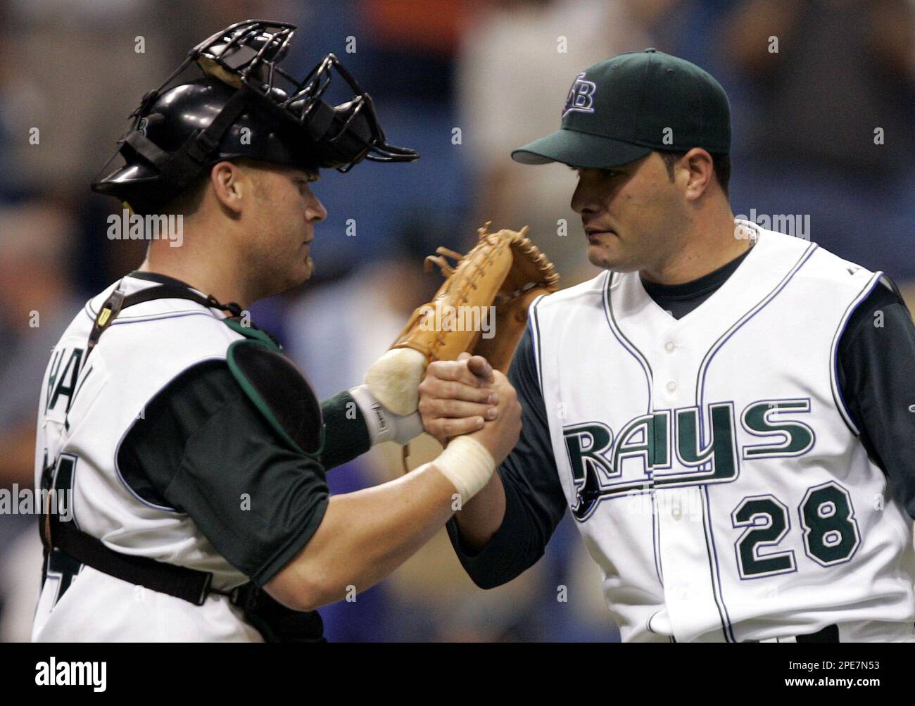 Tampa Bay Devil Rays pitcher Danys Baez, right, and catcher Toby Hall ...