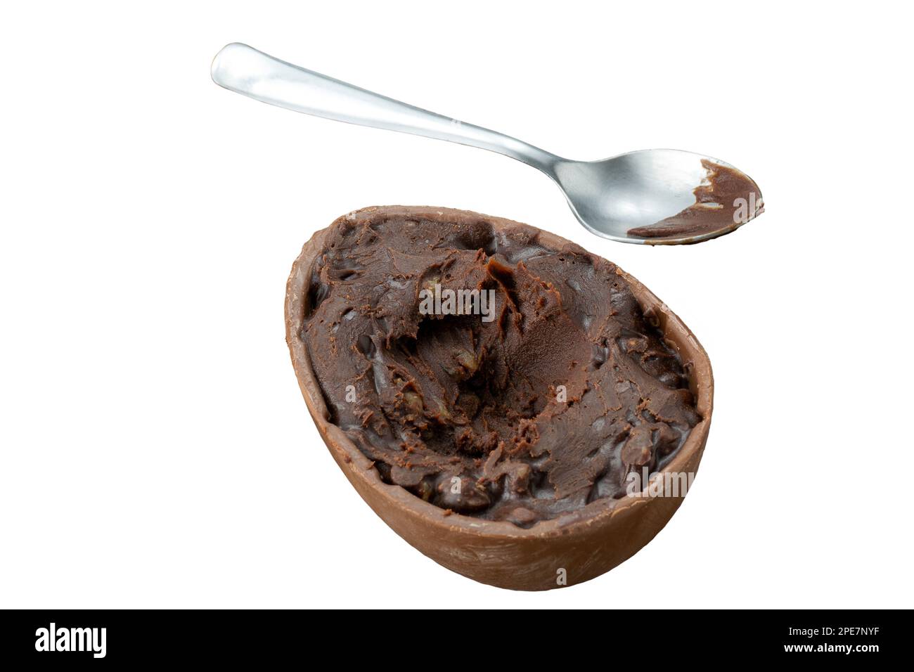 Chocolate easter egg filled with nuts and dark chocolate next to a ...