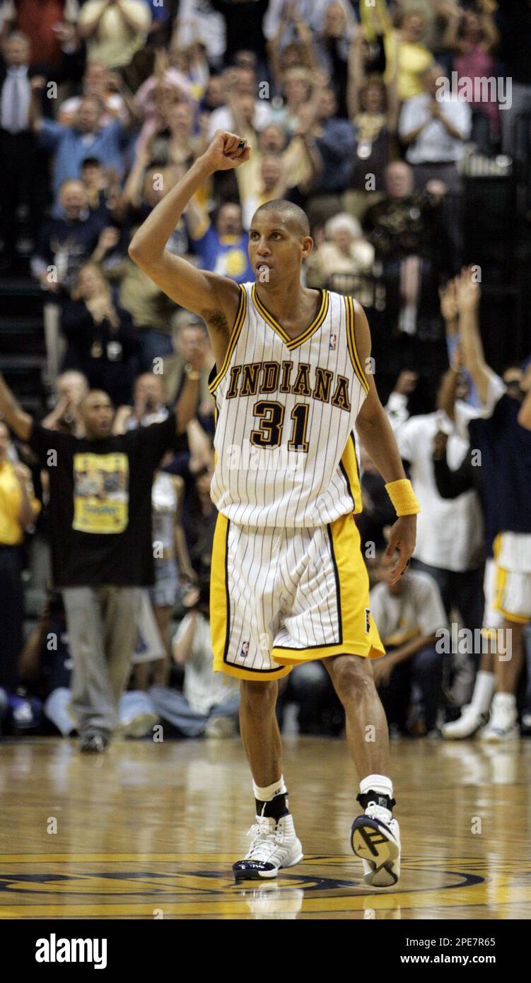 Indiana Pacers guard Reggie Miller reacts after teammate Anthony ...