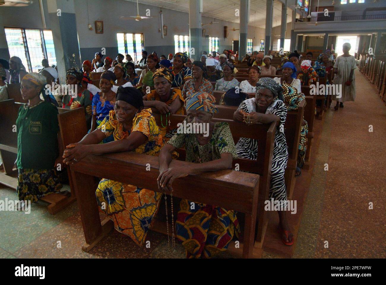 Catholic faithful attend evening mass at st. Edward's catholic in ...
