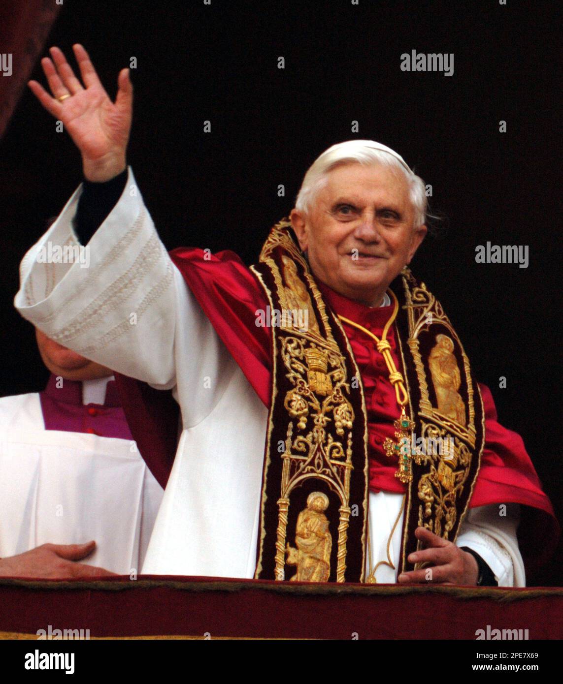 The newly elected Pope, Joseph Ratzinger of Germany, waves to the crowd ...