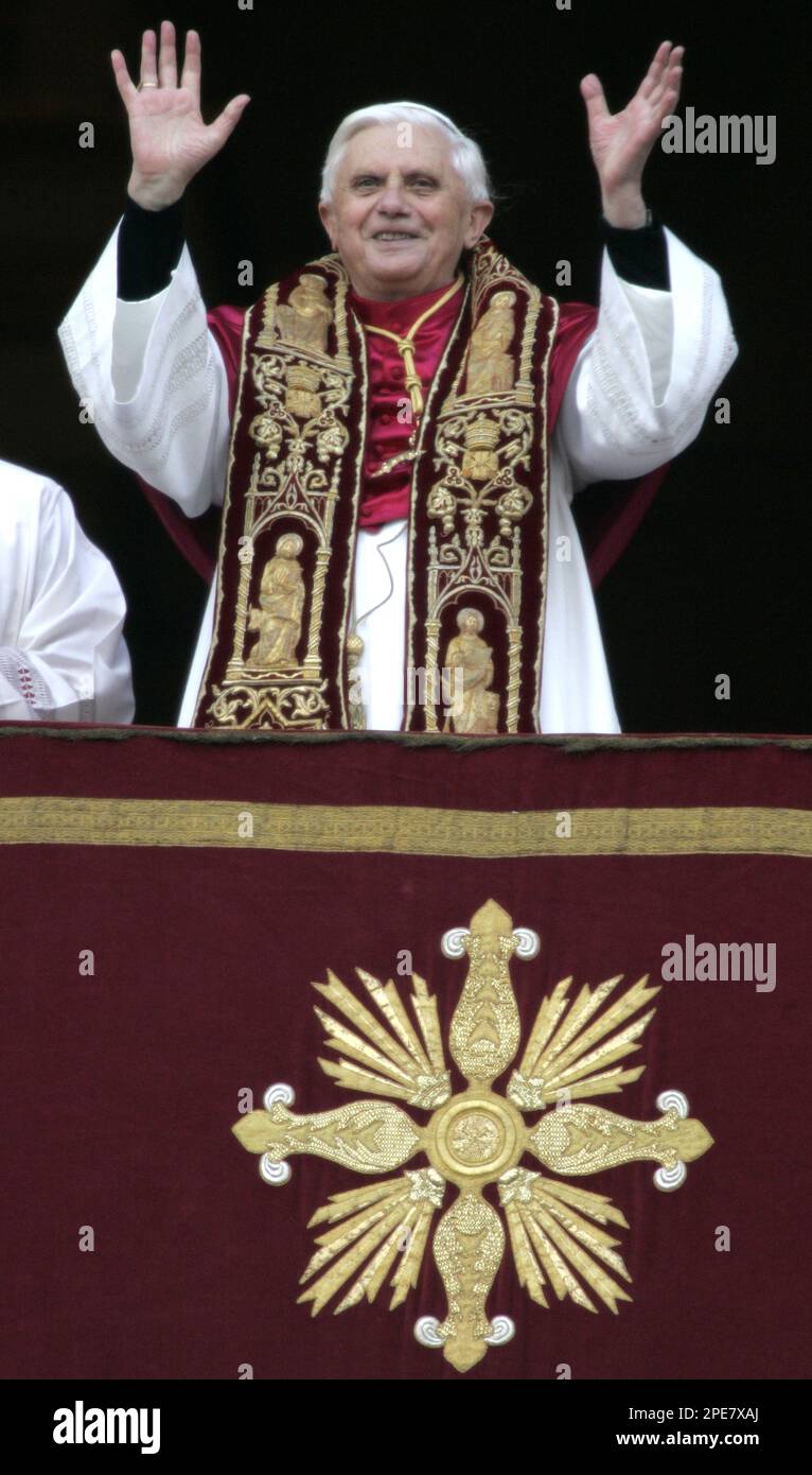 The newly elected Pope, Joseph Ratzinger of Germany, waves to the crowd ...