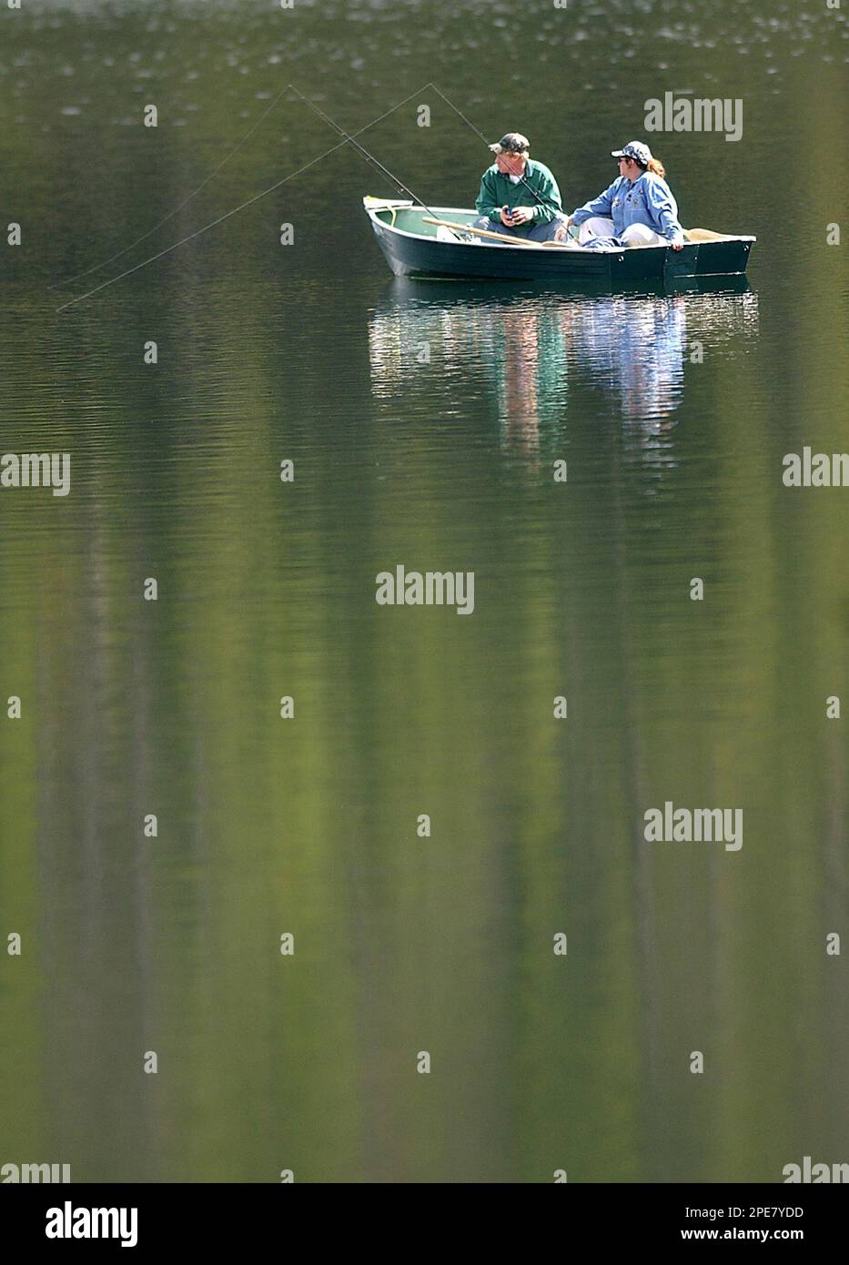 Mark Haig, left, and Jacqui Anderson quietly wait for a bite while ...