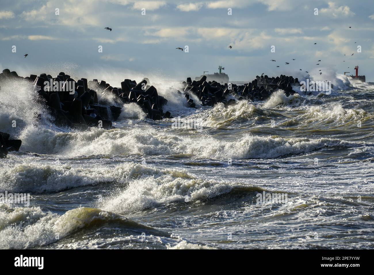 Coastal storm in the Baltic Sea, big waves crash against the concrete ...