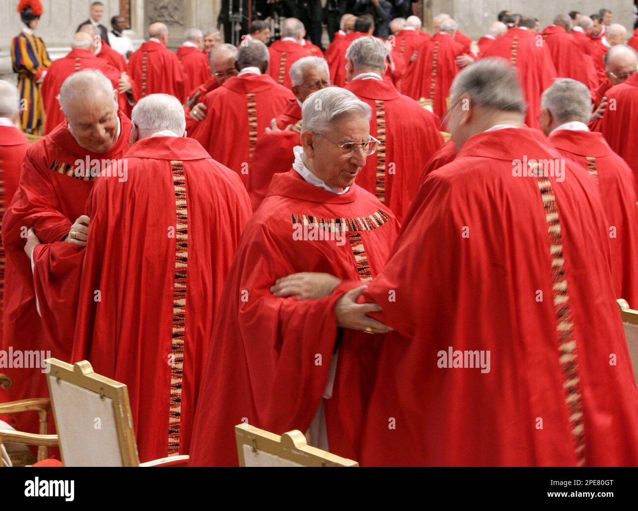 Cardinals exchage the sign of peace during a Mass in St. Peter's ...