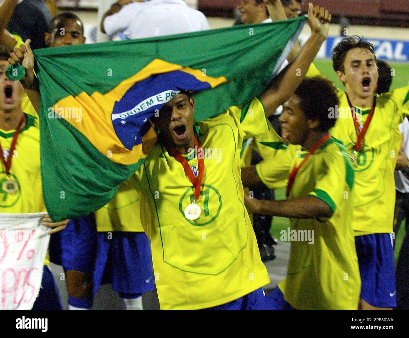 Brazil Tacio Barbosa waves a national flag after winning the U-17 South ...